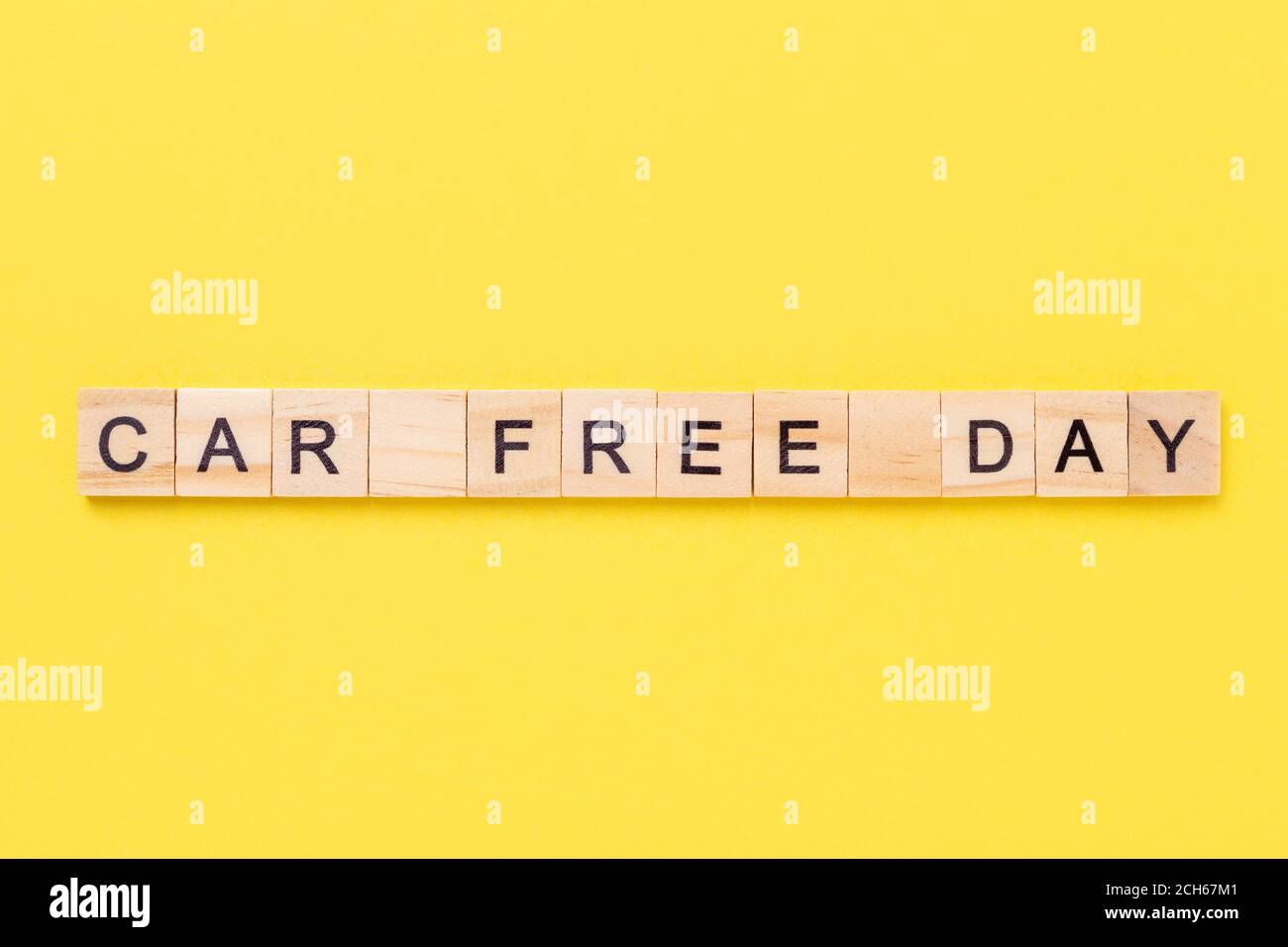 Text Car Free Day on yellow background. Concept of world car free day ... Text Car Free Day on yellow background. Concept of world car free day ...
