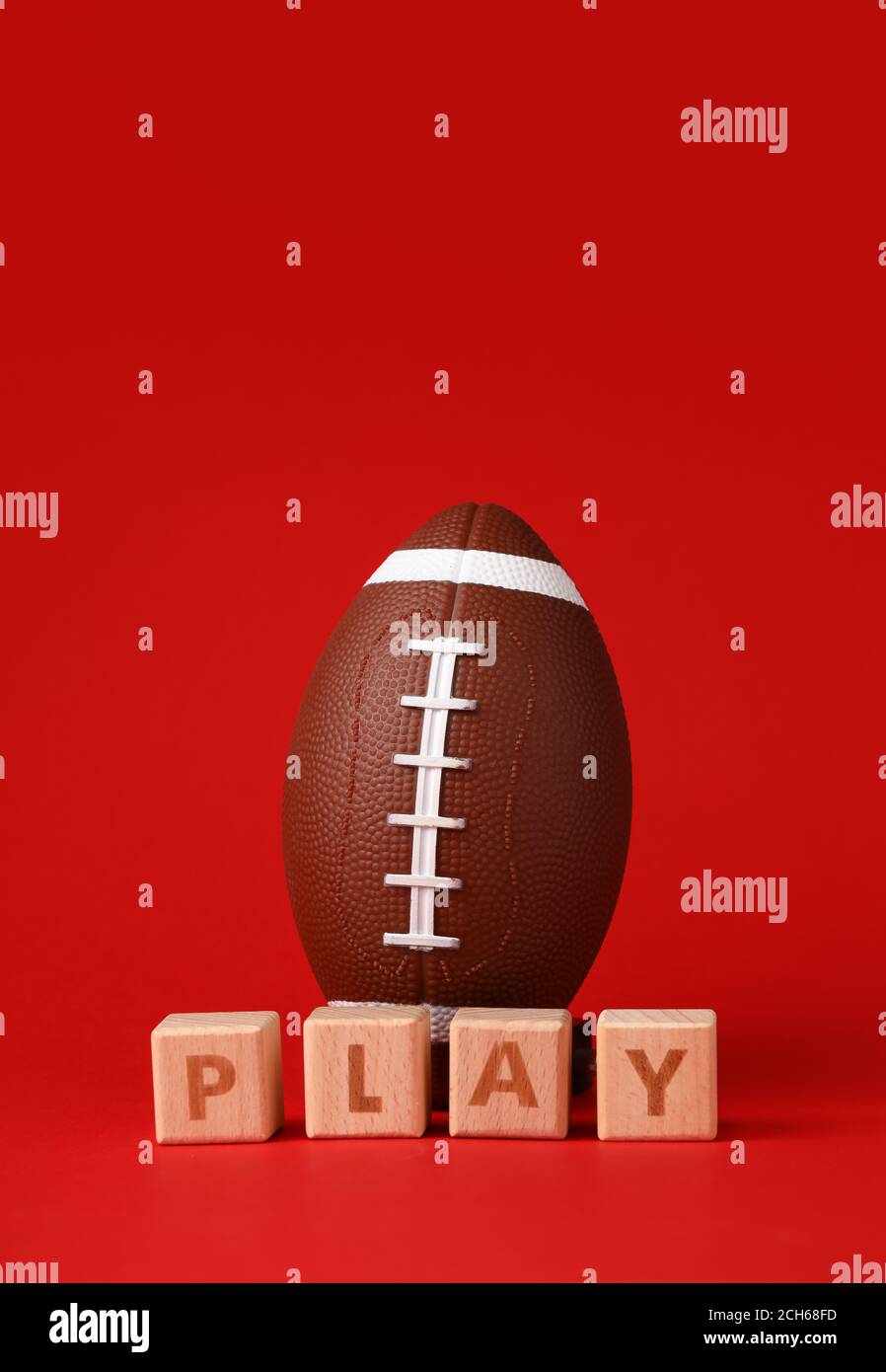 Rugby ball and cubes with text PLAY on color background Stock Photo - Alamy