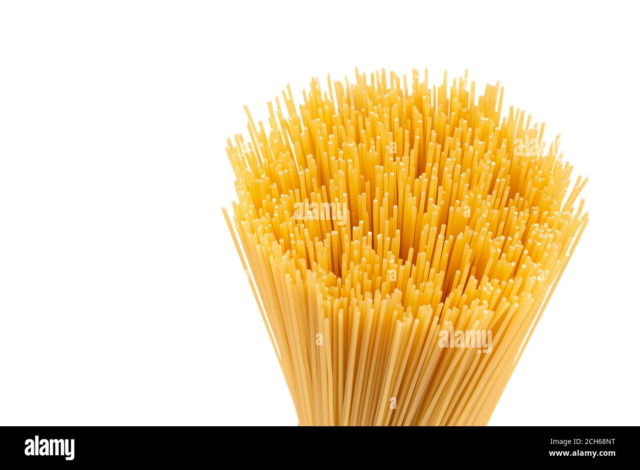 Close-up photo of uncooked spaghetti isolated on white background ...