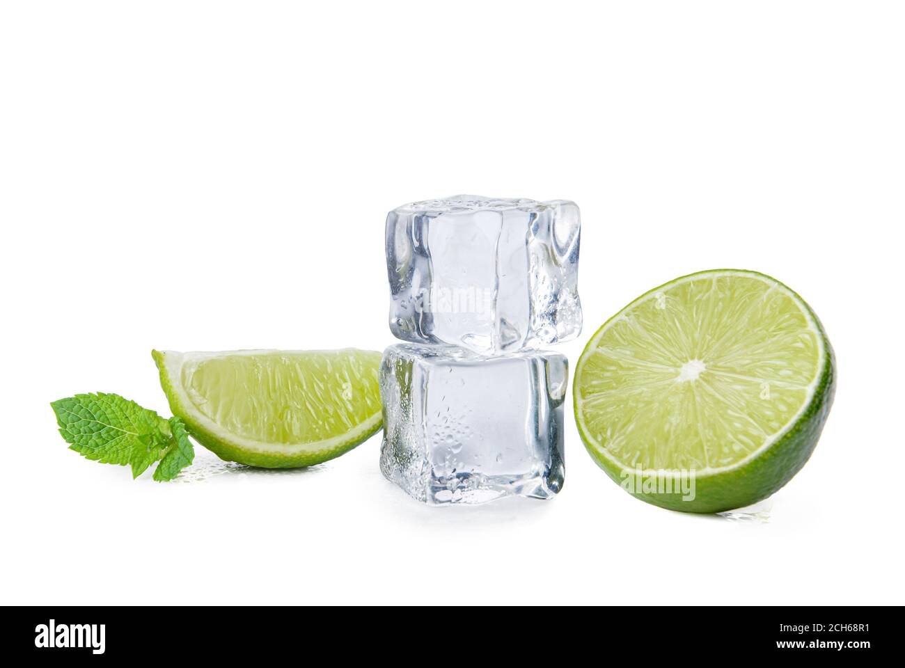 Ice cubes, lime and mint on white background Stock Photo - Alamy