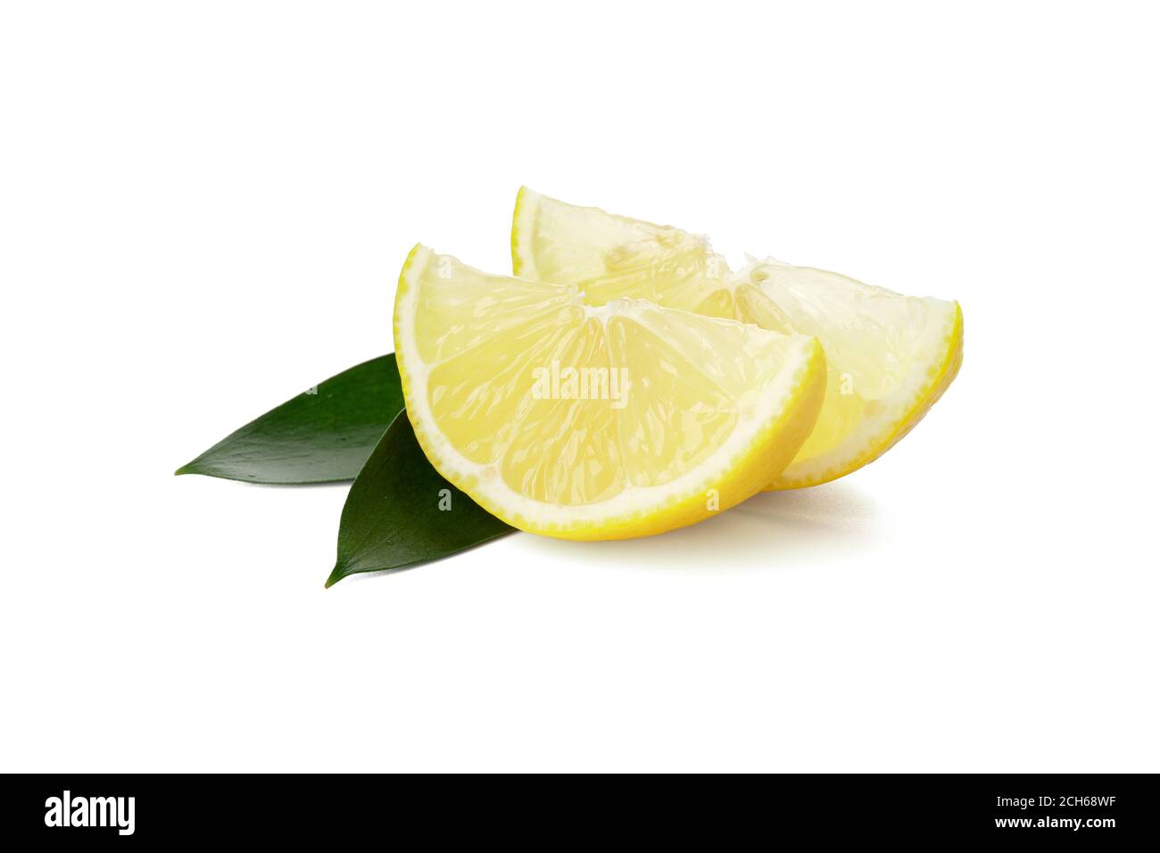 Pieces of ripe lemon on white background Stock Photo - Alamy