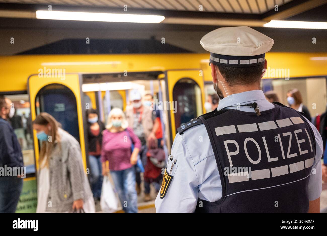 Stuttgart, Germany. 14th Sep, 2020. Police officers check at a public ...
