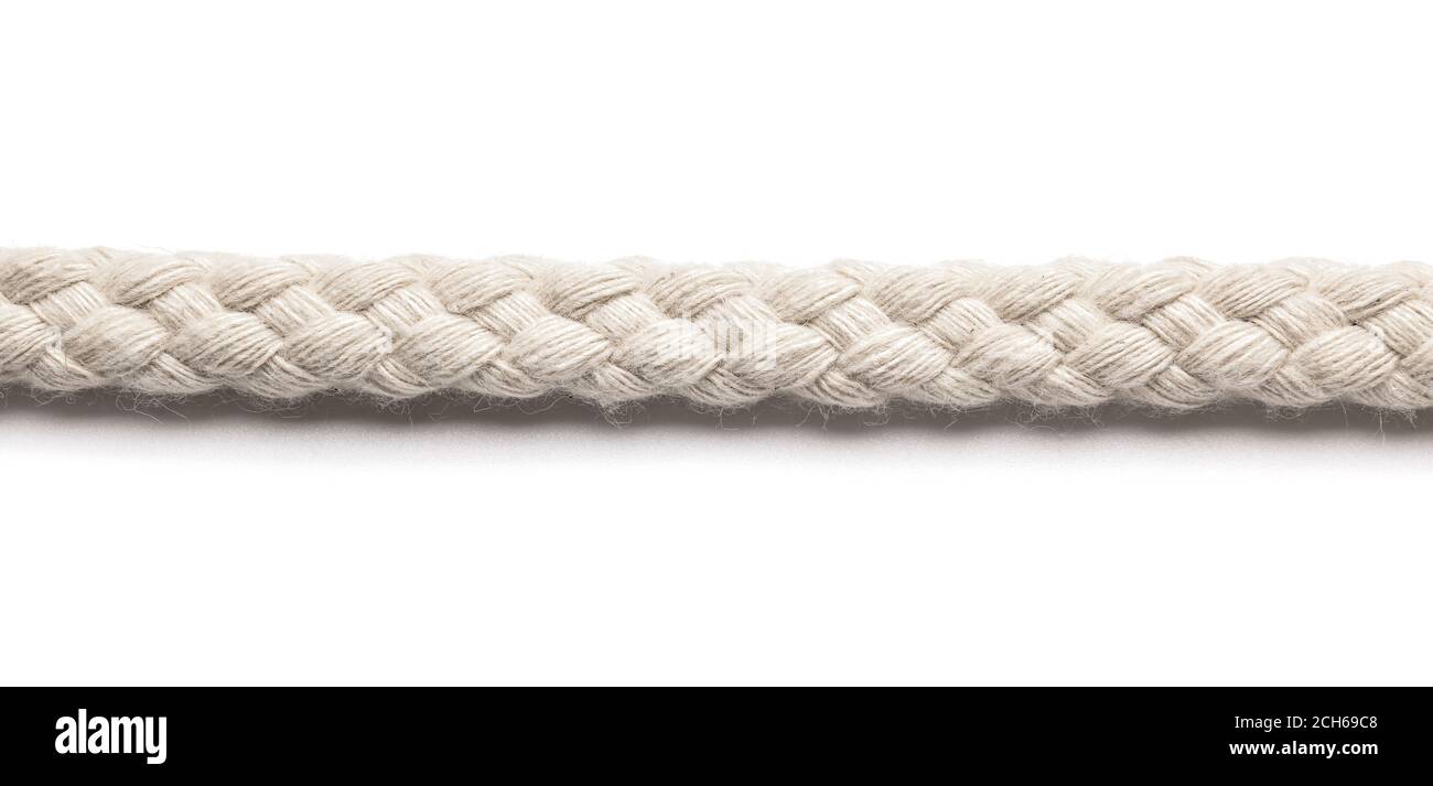 Long rope on white background Stock Photo - Alamy