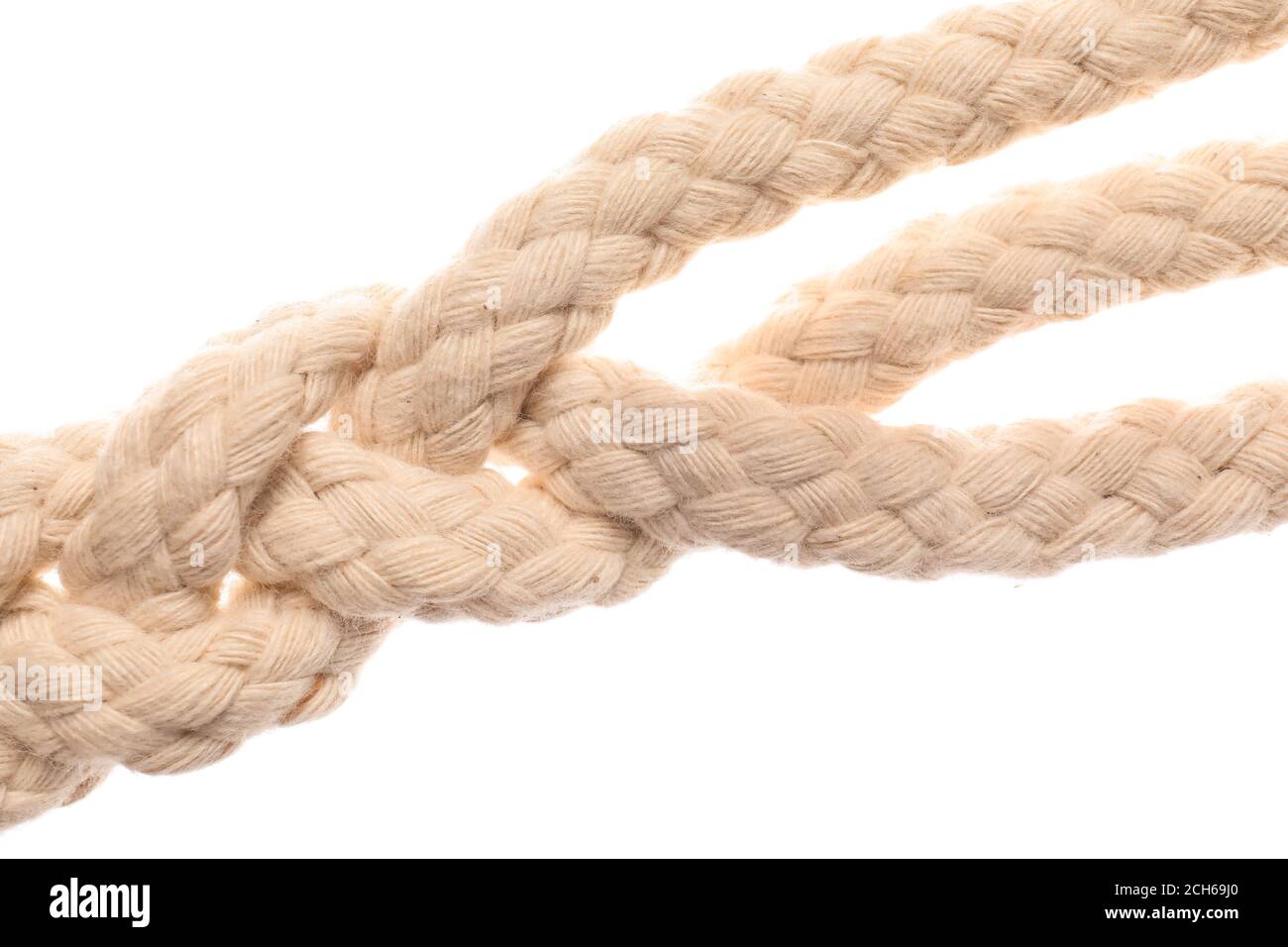 Braided rope on white background Stock Photo - Alamy