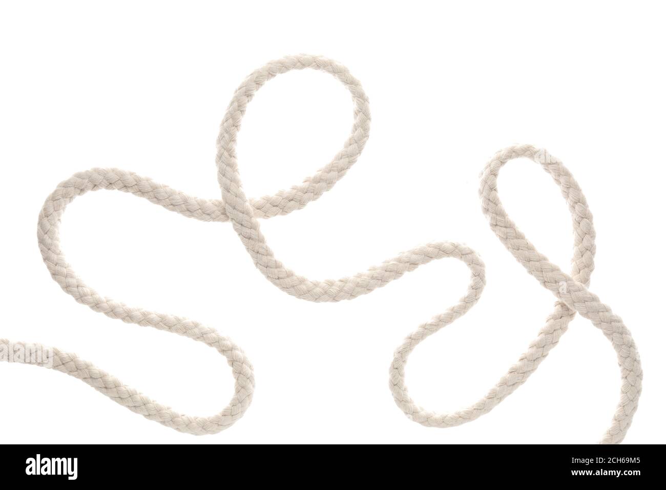 Long rope on white background Stock Photo - Alamy