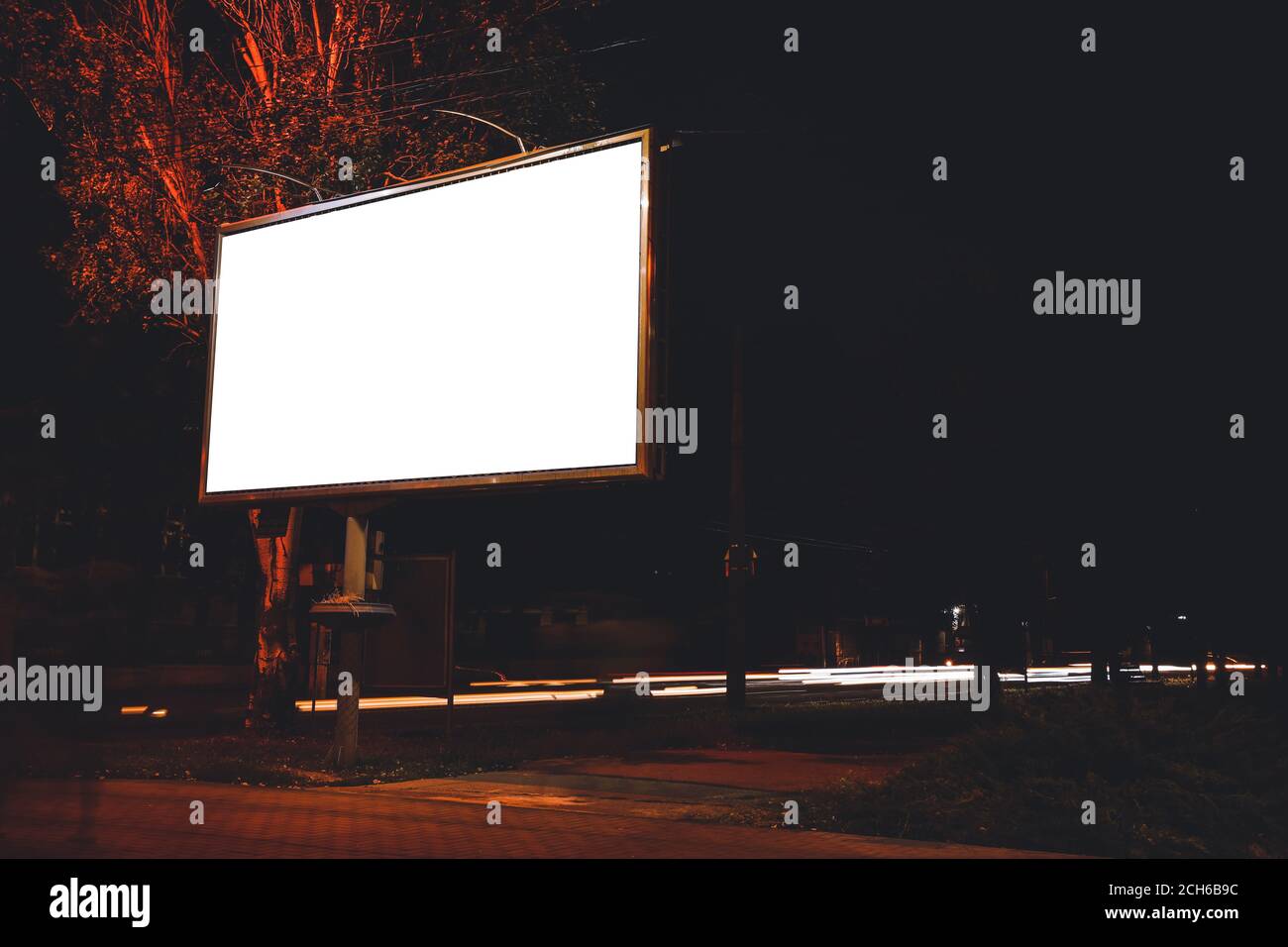 Advertising billboard at night outdoors Stock Photo - Alamy