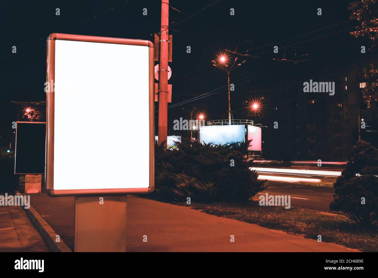 Advertising billboard at night outdoors Stock Photo - Alamy