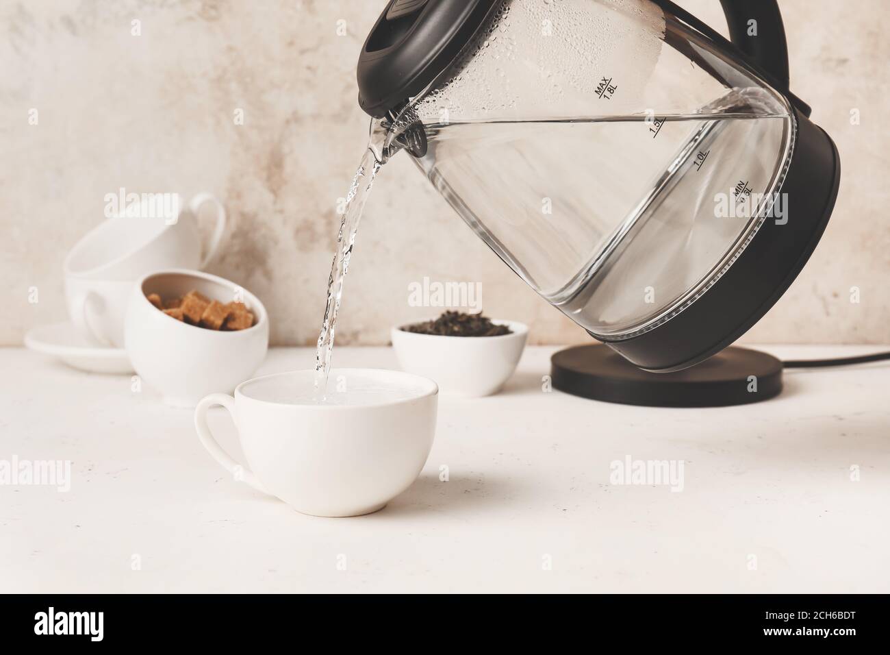 Pouring boiling water in cup hi-res stock photography and images - Alamy