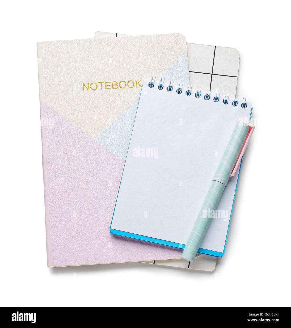 Notebooks and pen on white background Stock Photo - Alamy