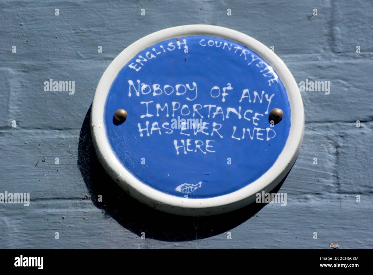 Humorous Blue Plaque Stock Photo - Alamy