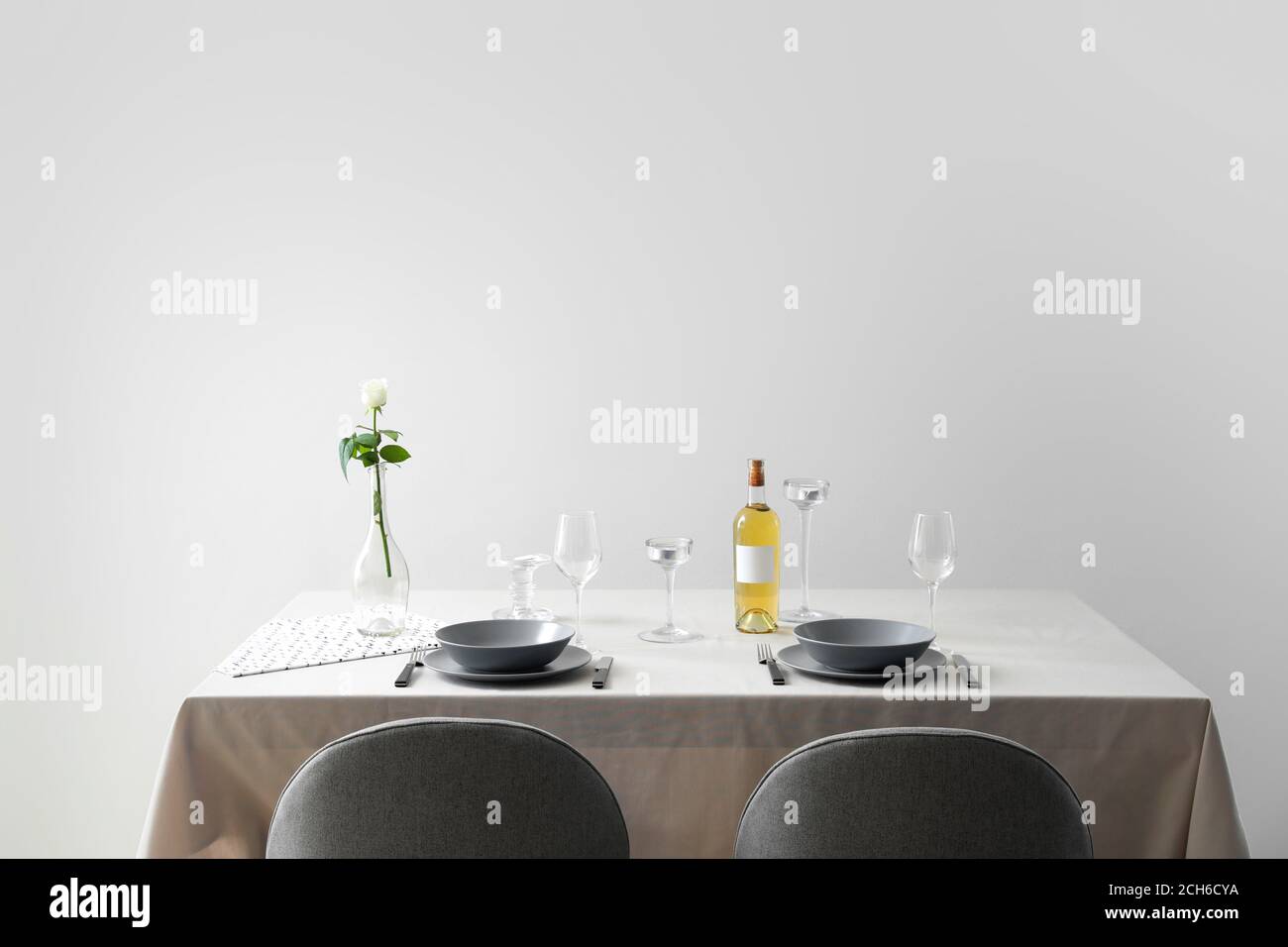 Set table in light room Stock Photo - Alamy
