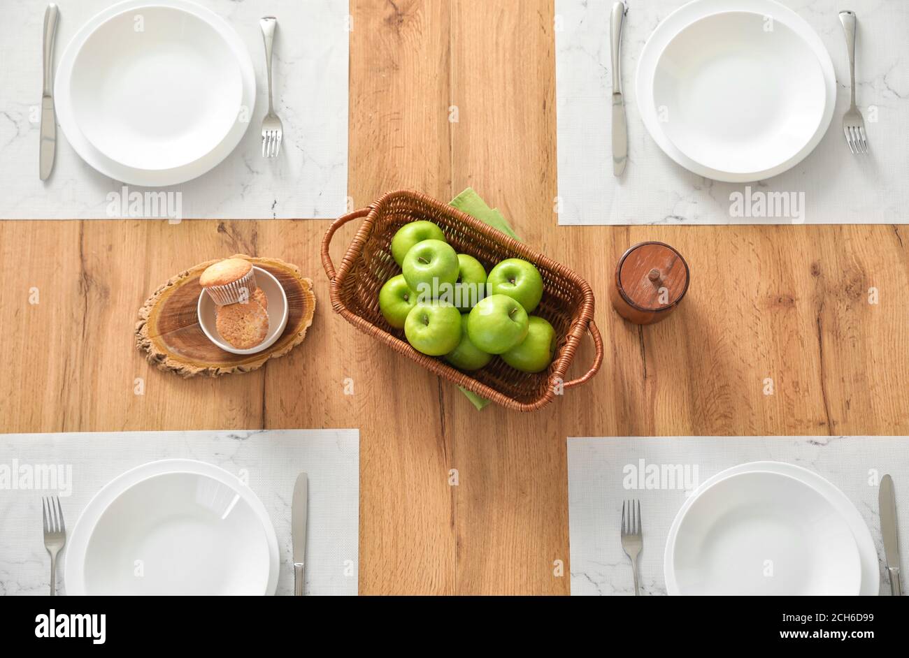 Table set in modern dining room, top view Stock Photo - Alamy