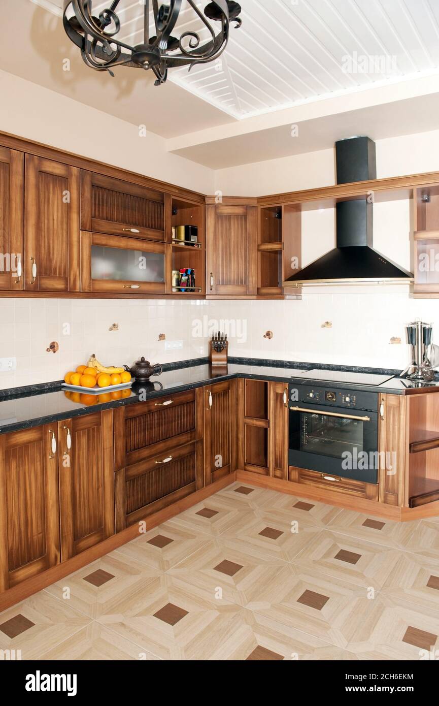 Modern design wooden brown Kitchen Interior Stock Photo - Alamy