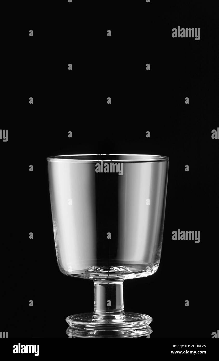 Empty glass on dark background Stock Photo - Alamy