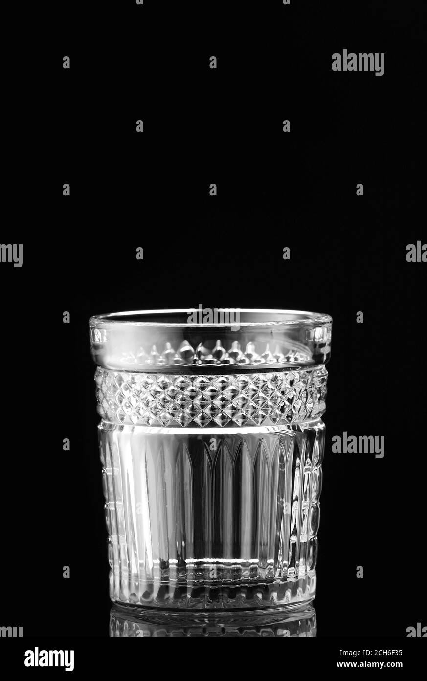 Empty glass on dark background Stock Photo - Alamy