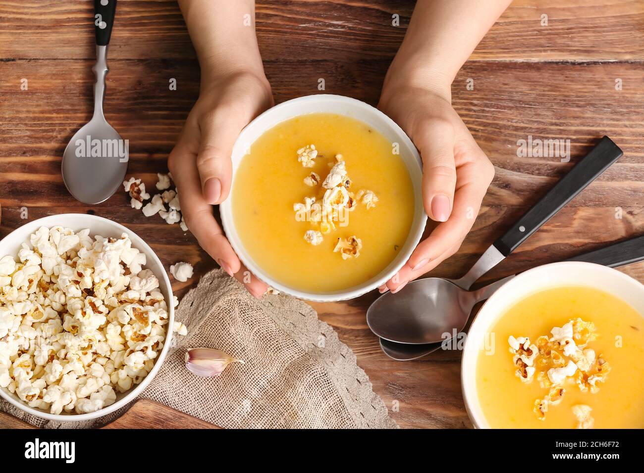 Person eating popcorn in bowl hi-res stock photography and images - Alamy
