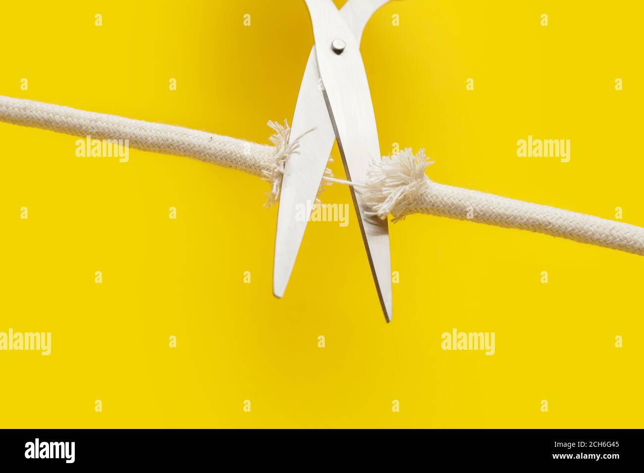 Cutting rope tension hi-res stock photography and images - Alamy