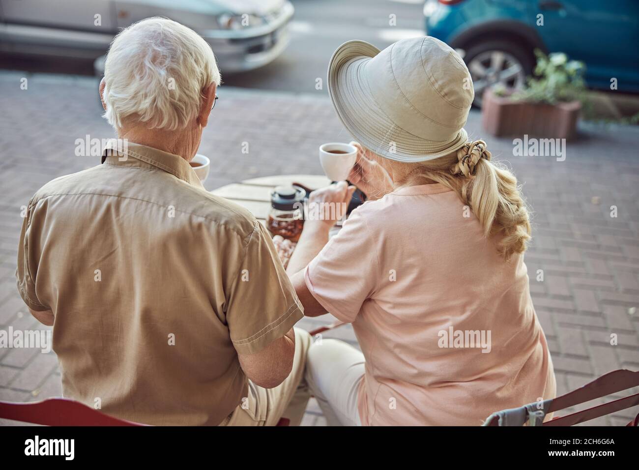 Old couple drinking tea outdoor hi-res stock photography and images - Alamy