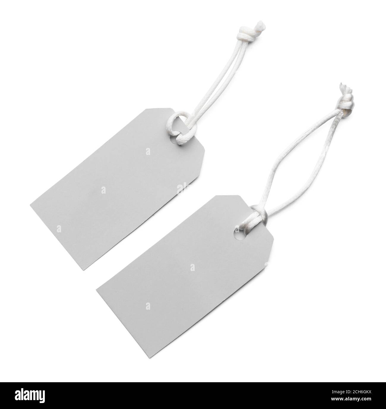 Blank paper tags on white background Stock Photo - Alamy