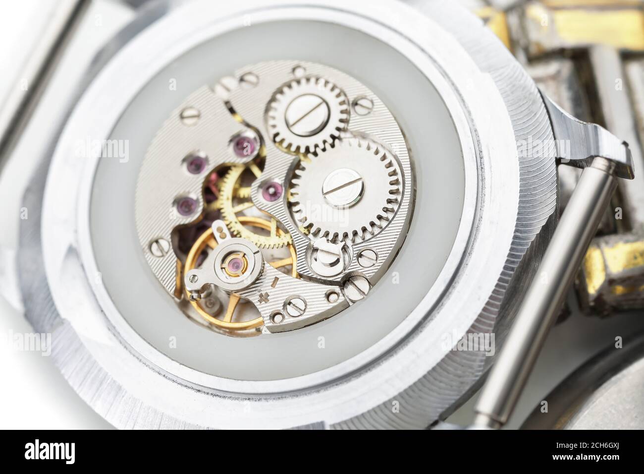 Inside view of watch mechanism, closeup Stock Photo - Alamy