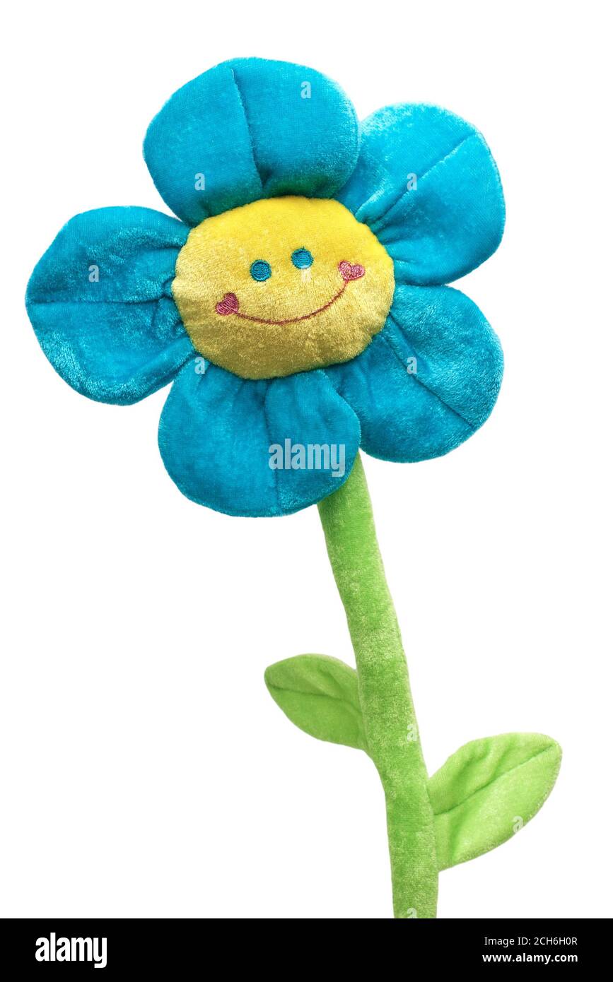 Smiling flower toy with blue petals and green leaves isolated on white ...