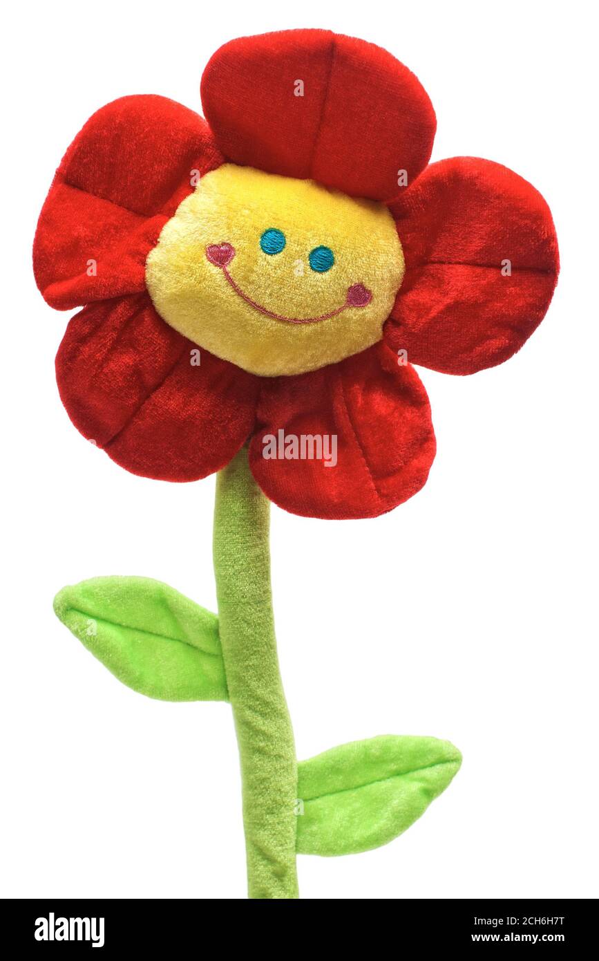 Smiling flower toy with green leaves isolated on white Stock Photo - Alamy