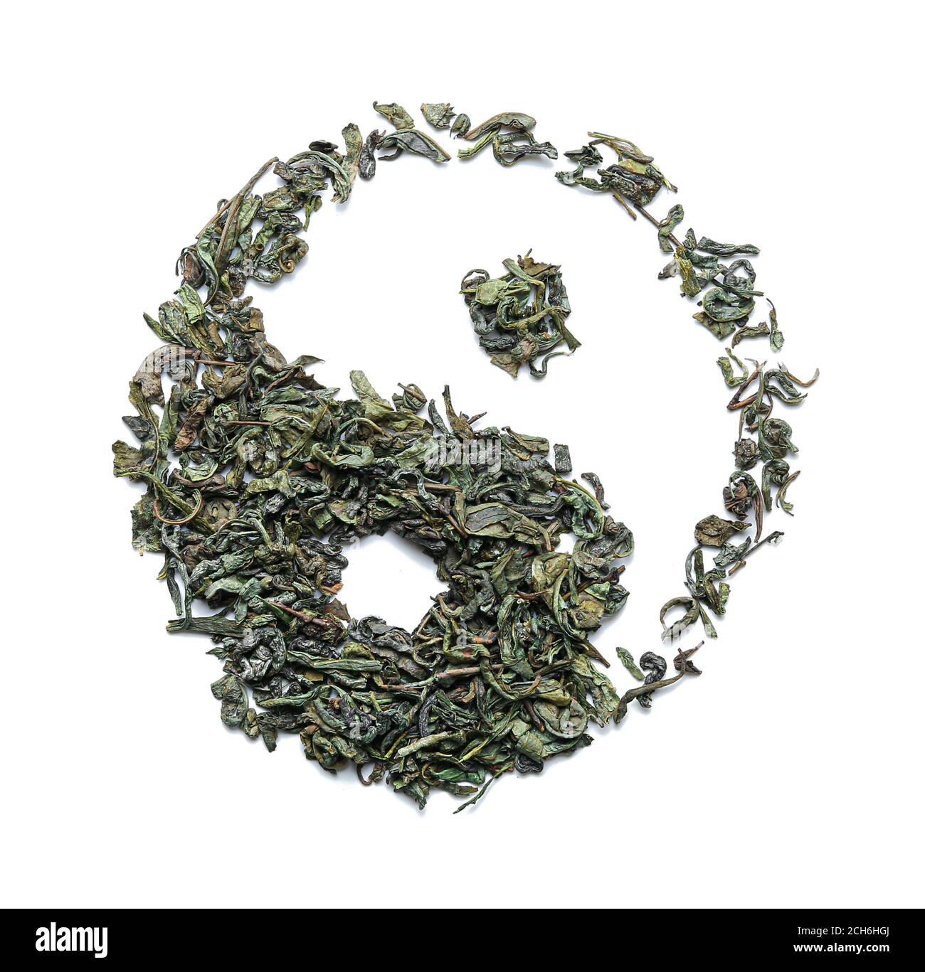 Yin yang symbol made of dry tea leaves on white background Stock Photo ...