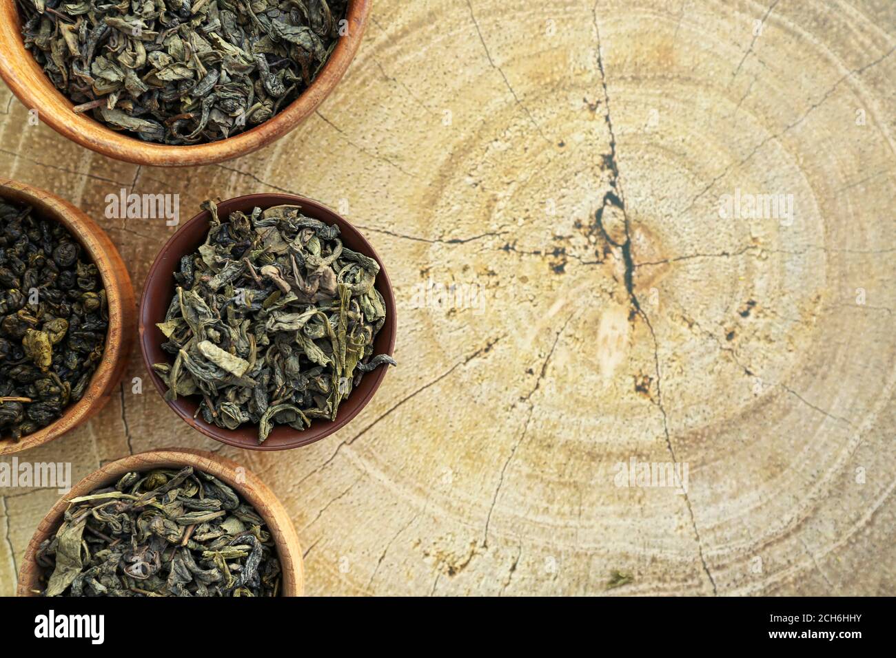 Bowls with dry tea leaves on table Stock Photo - Alamy