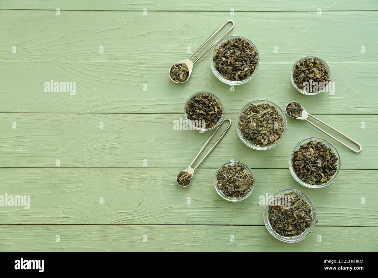 Bowls with dry tea leaves on table Stock Photo - Alamy