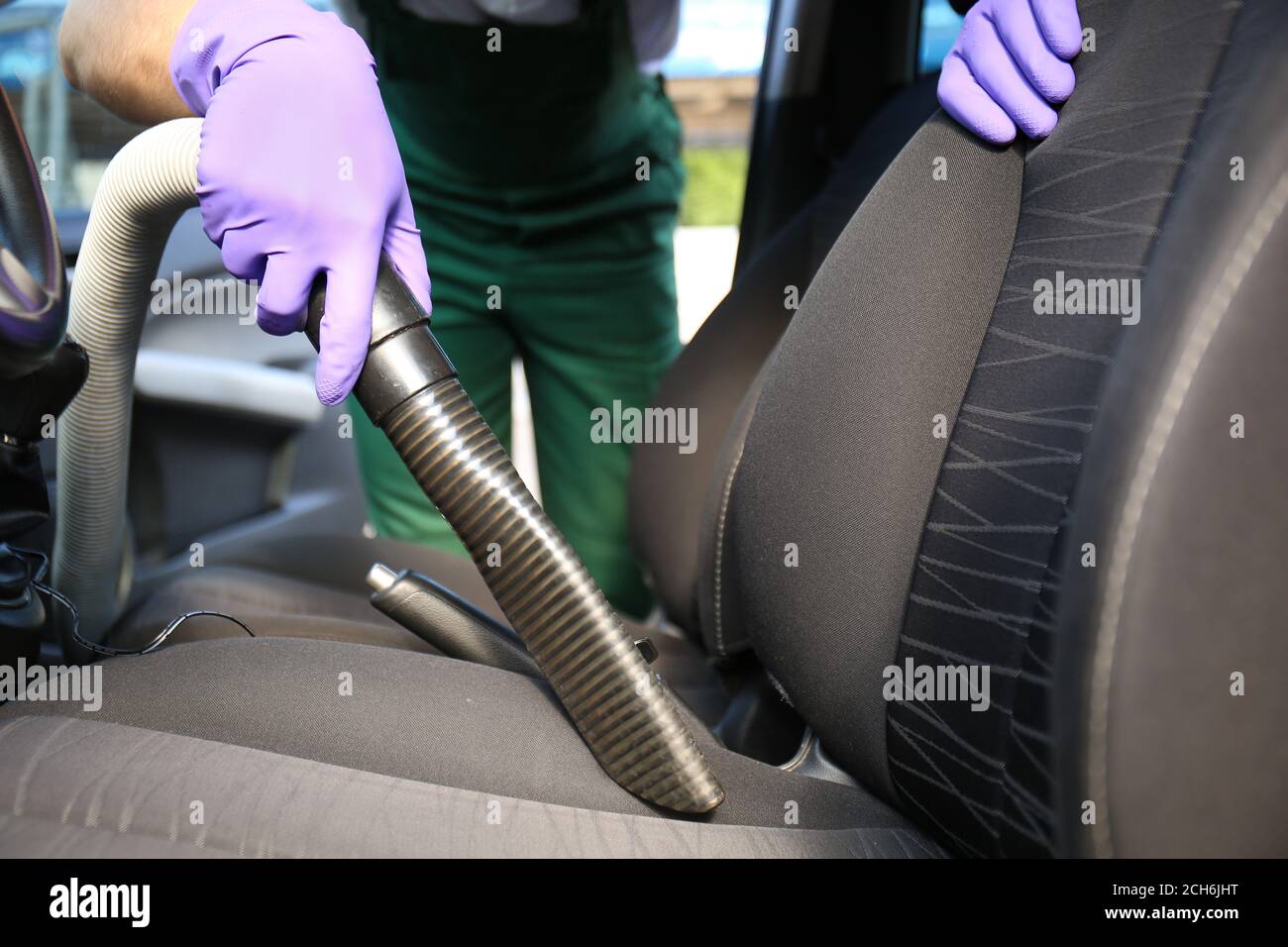 Man hoovering seat car hi-res stock photography and images - Alamy