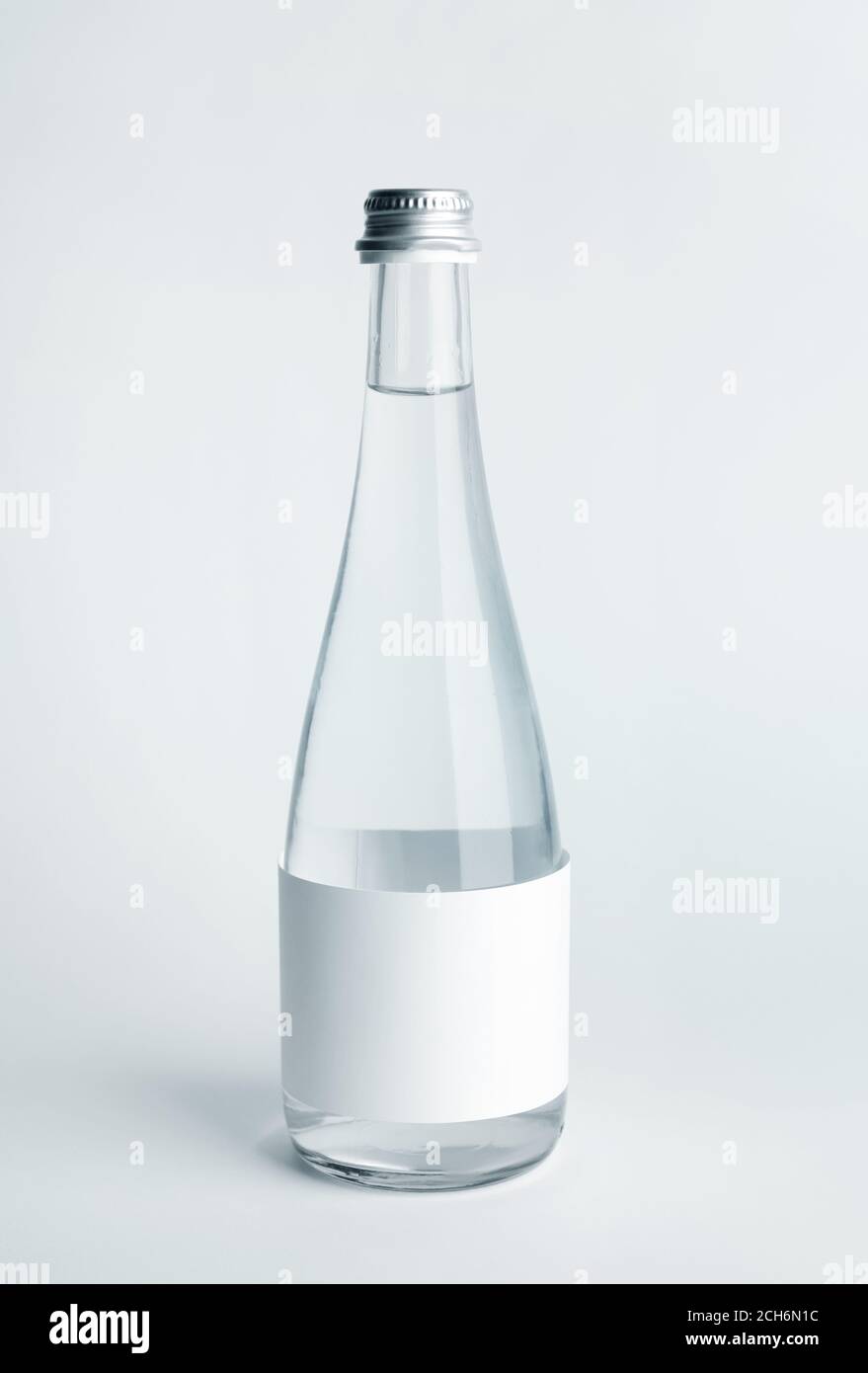 Bottle of clean water on light background Stock Photo - Alamy