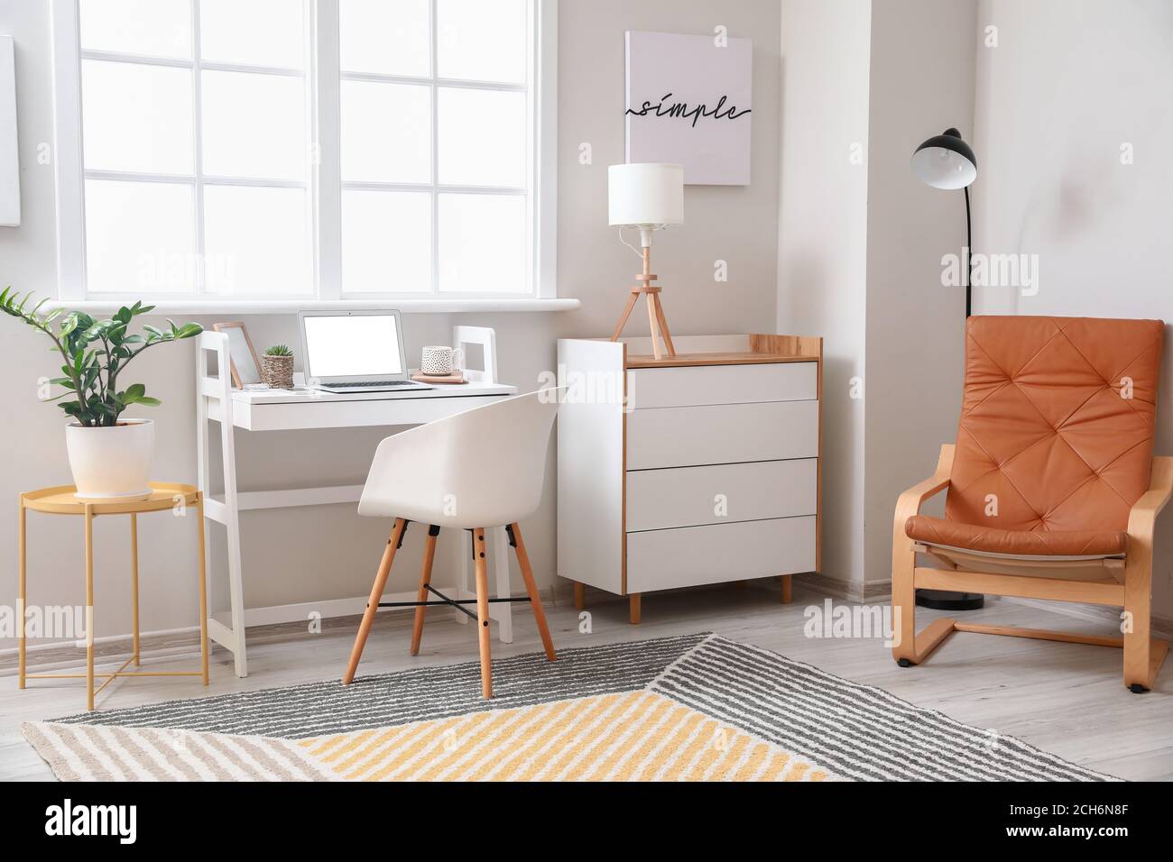 Interior of room with modern workplace Stock Photo - Alamy