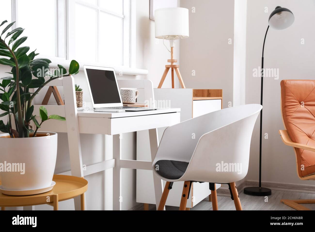 Interior of room with modern workplace Stock Photo - Alamy