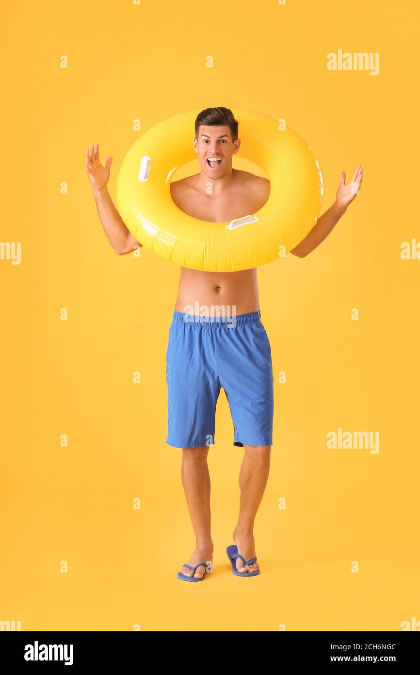 Surprised man inflatable ring hi-res stock photography and images - Alamy
