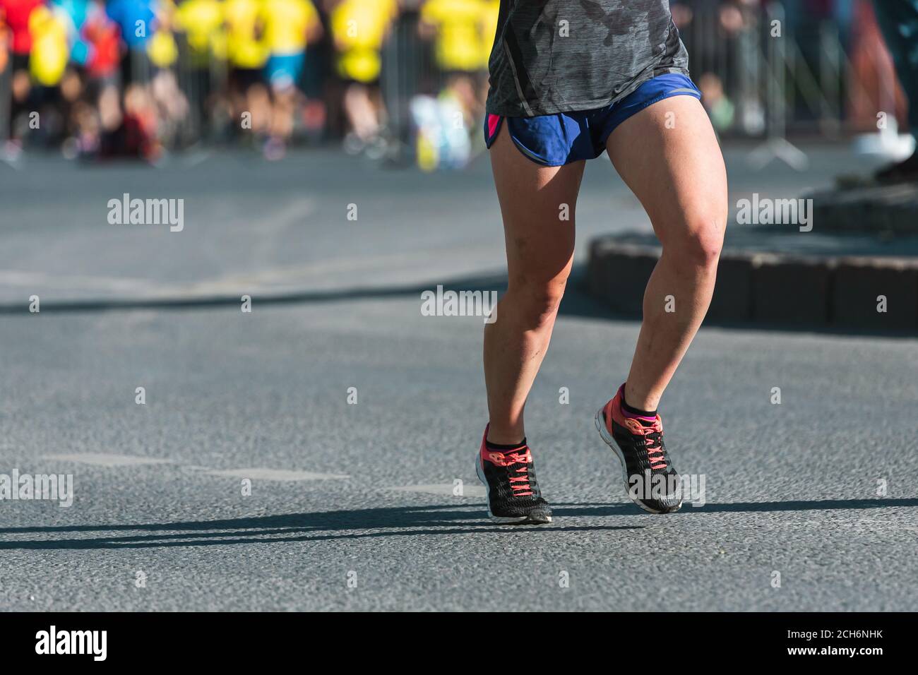 Marathon running race. Close up of the many runners feet on road racing ...