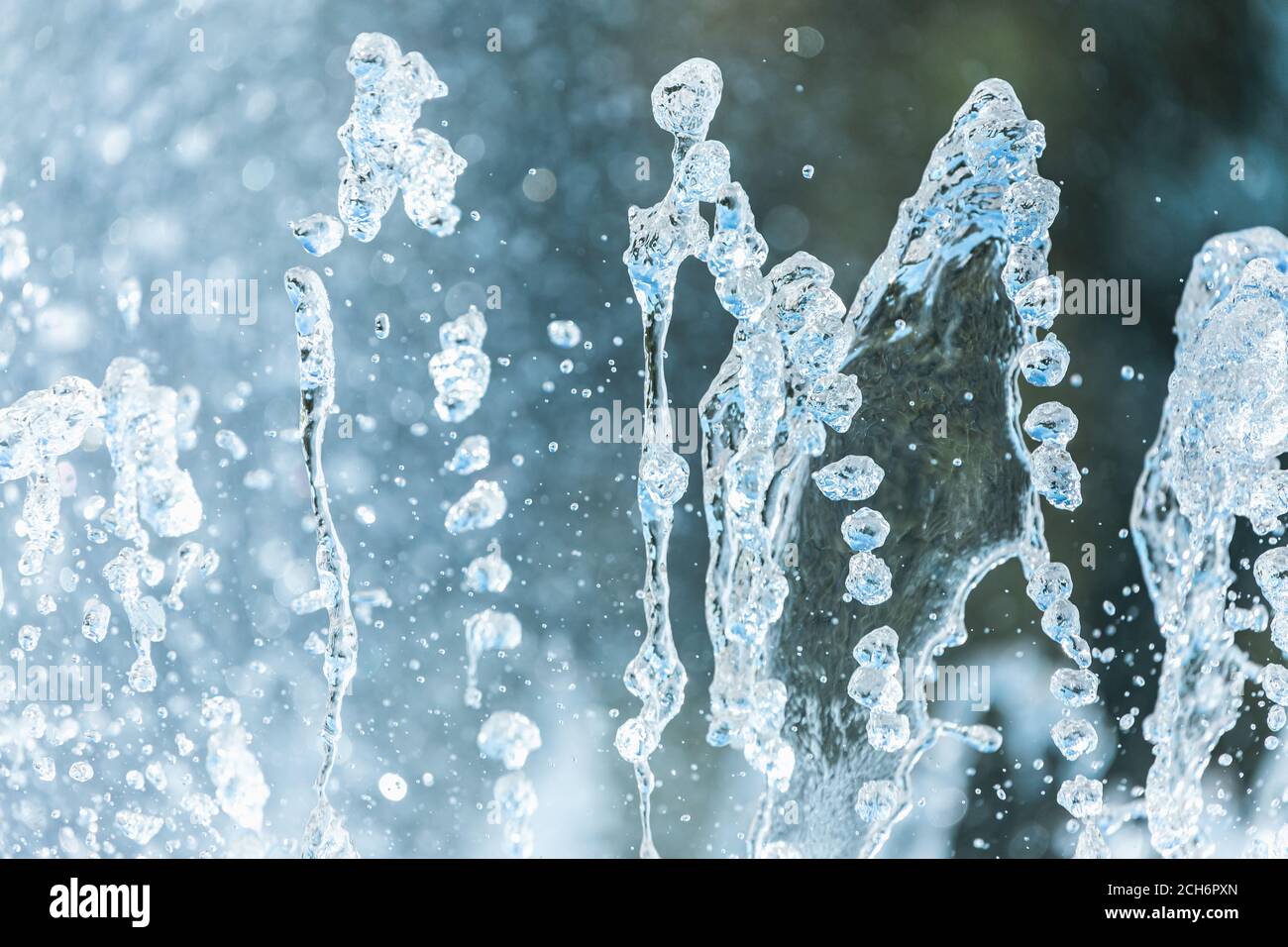 Close up of a water drops on a blue gradient background, covered with ...