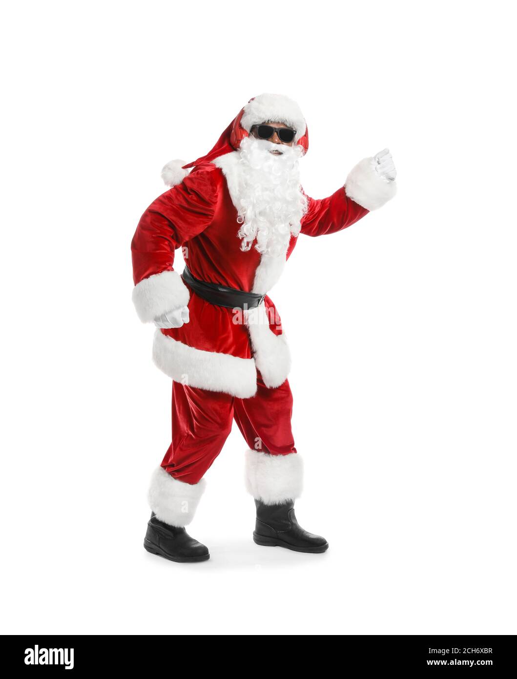 Cool African-American Santa Claus listening to music and dancing ...
