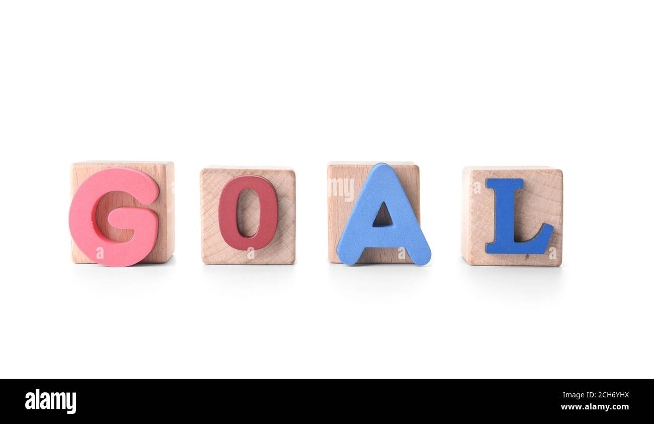 Wooden cubes with word GOAL on white background Stock Photo - Alamy