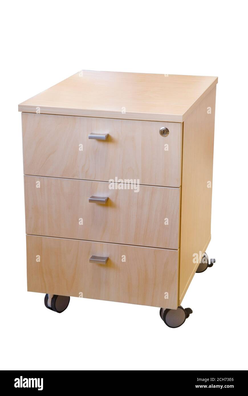 Wooden cabinet with three drawers Stock Photo - Alamy