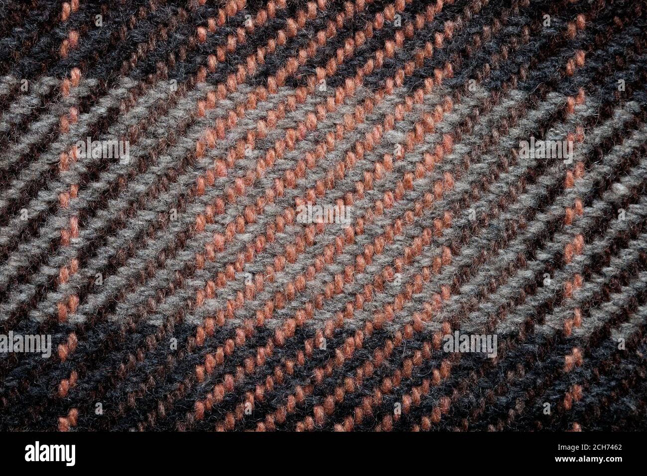Closeup of woolen tweed material texture with patterns Stock Photo - Alamy