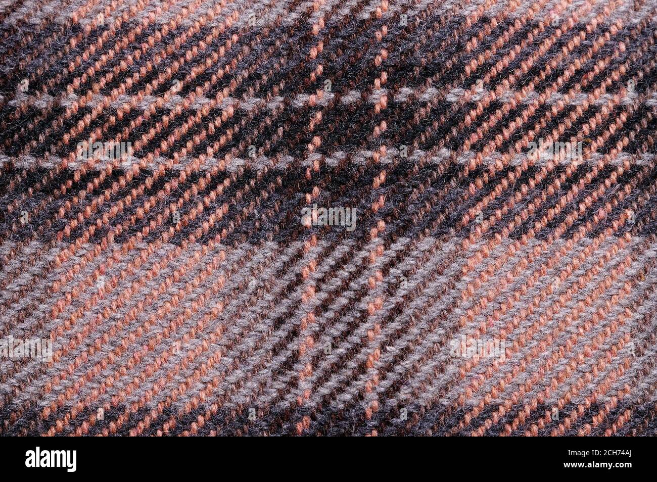 Closeup of woolen tweed material texture with patterns Stock Photo - Alamy