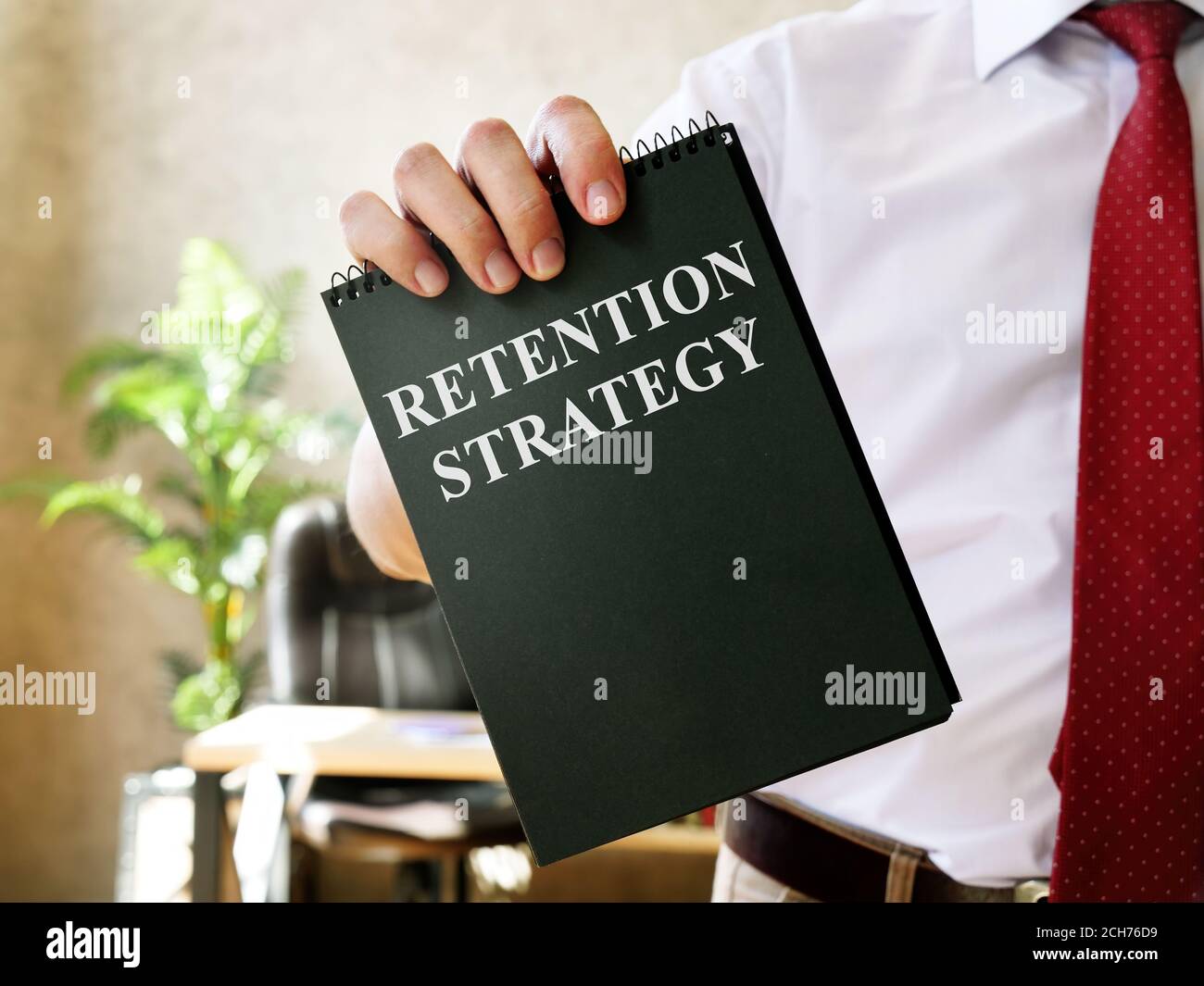 The manager demonstrates the retention strategy plan Stock Photo - Alamy