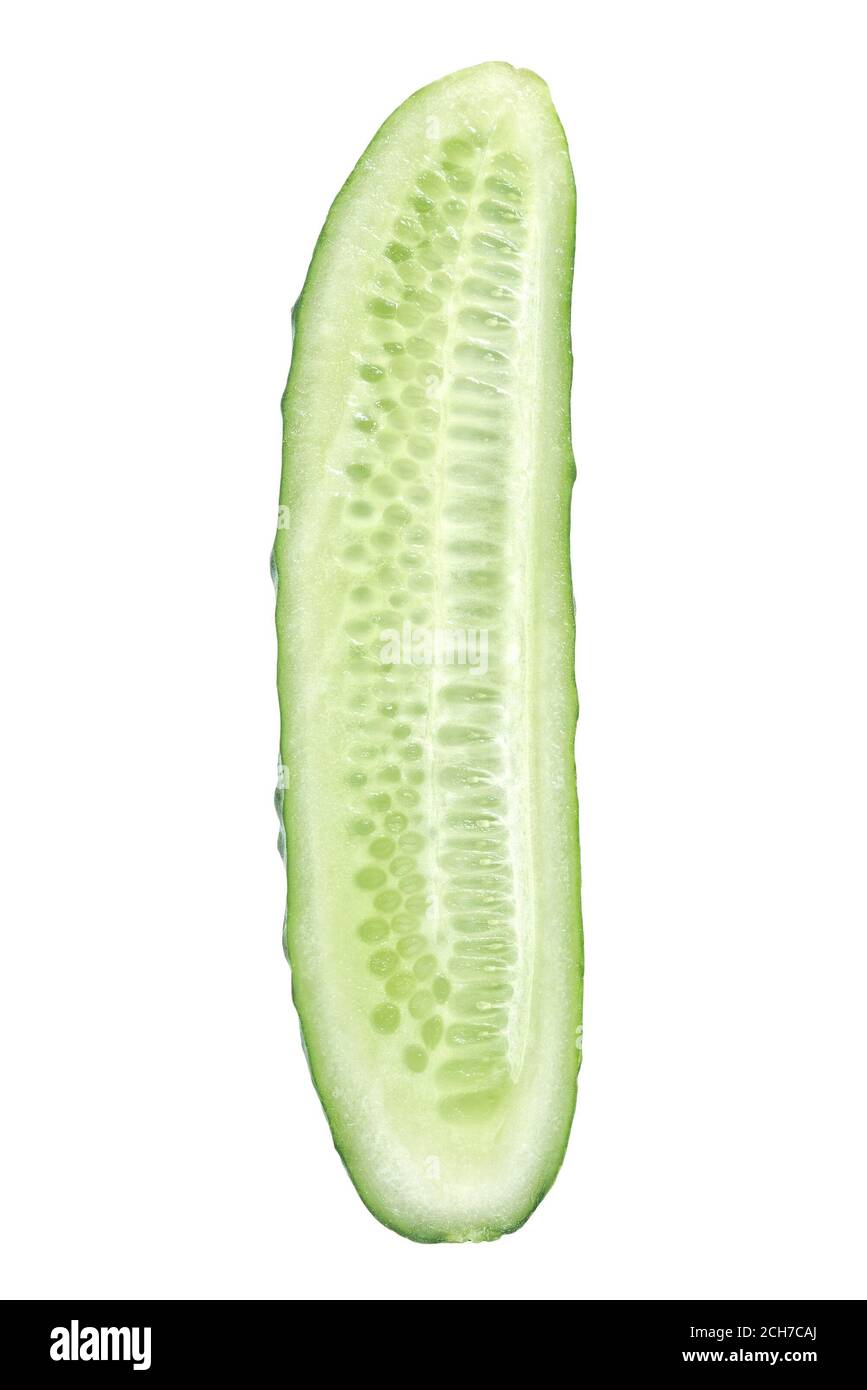 Cut half of standing green cucumber isolated on white Stock Photo - Alamy