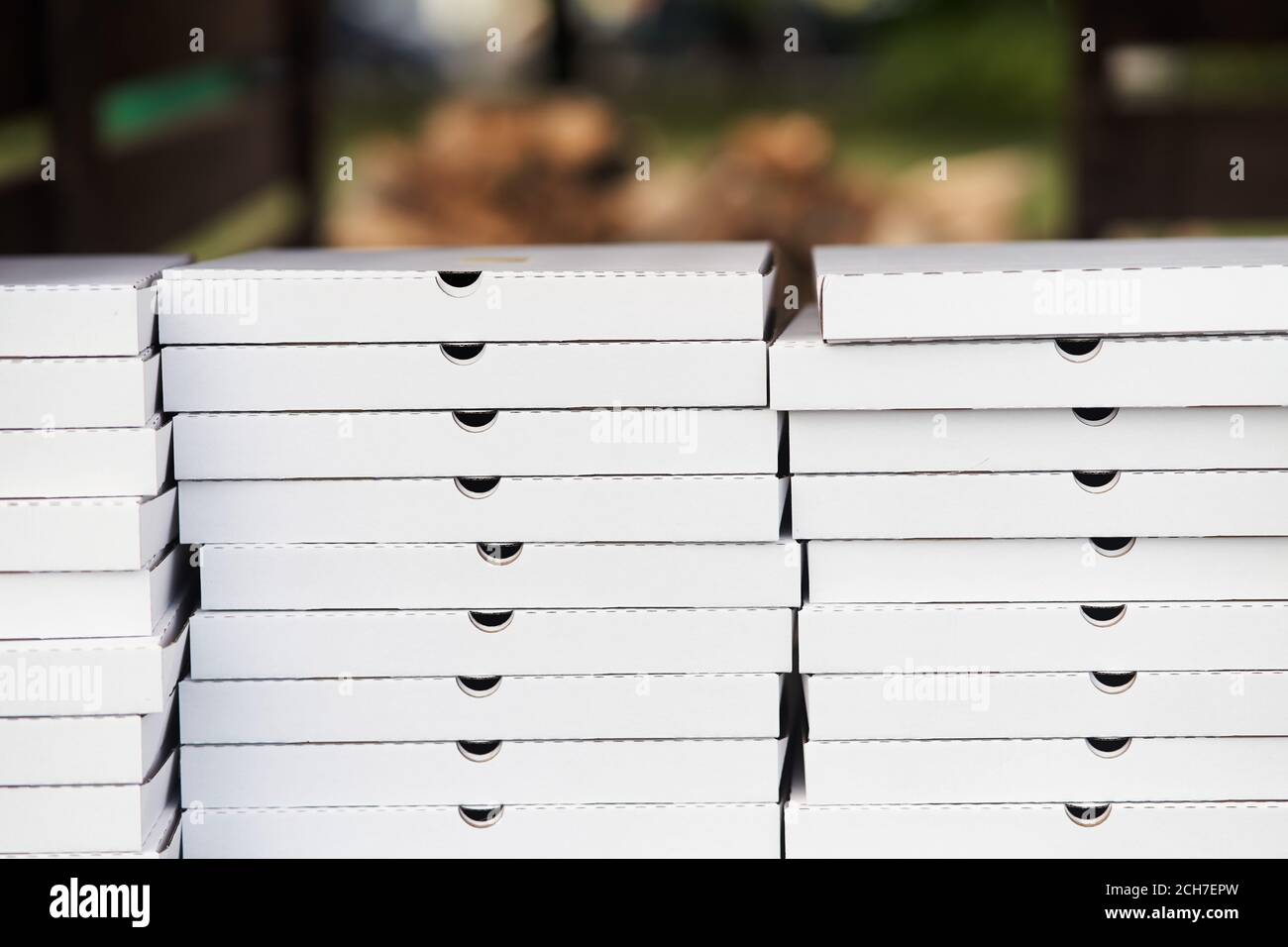 Stack of white cardboard pizza packages. Pizza packages close-up Stock ...