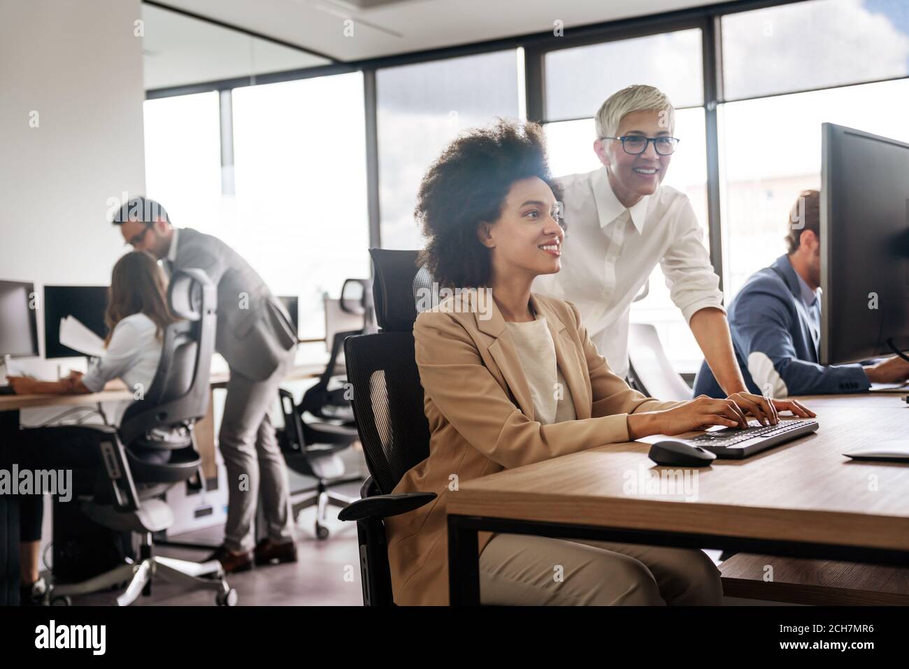 Programmer working in a software developing company Stock Photo - Alamy