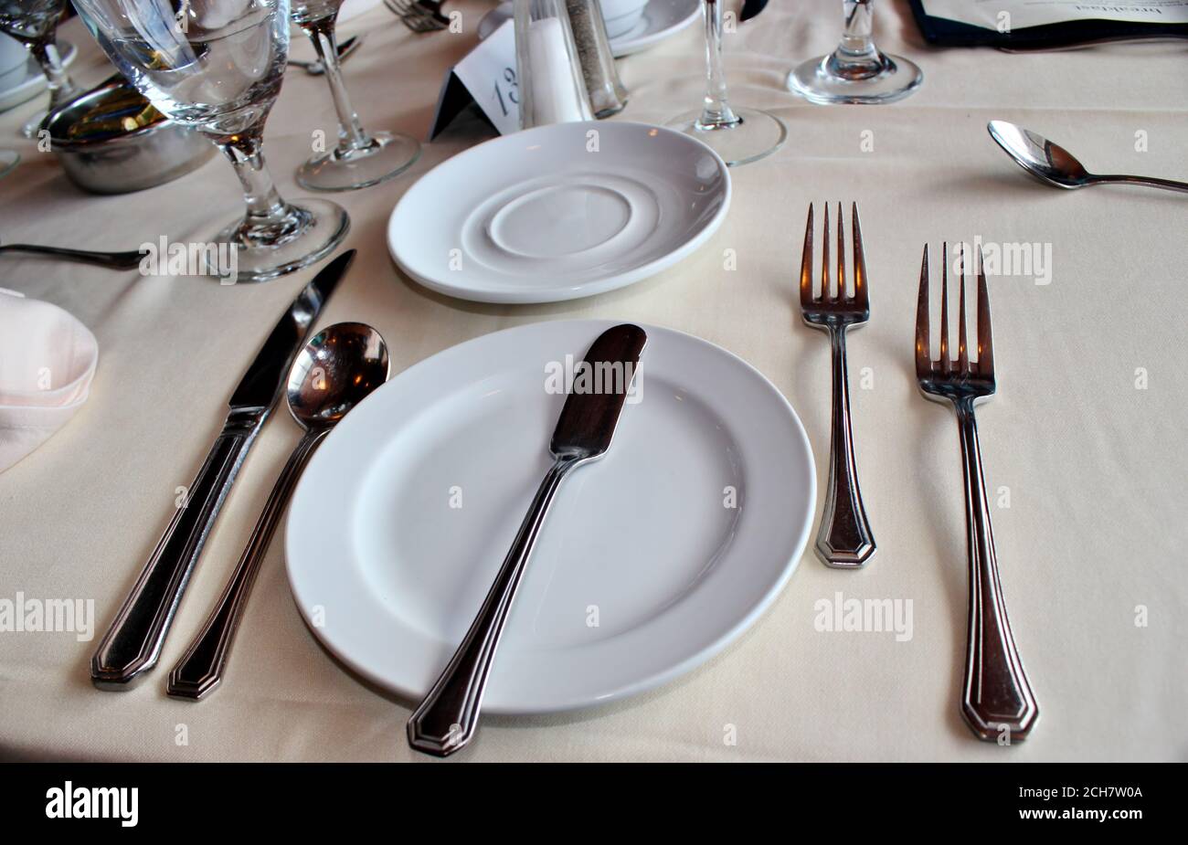 Formal table setting of dishes and cutlery for special occasion Stock ...