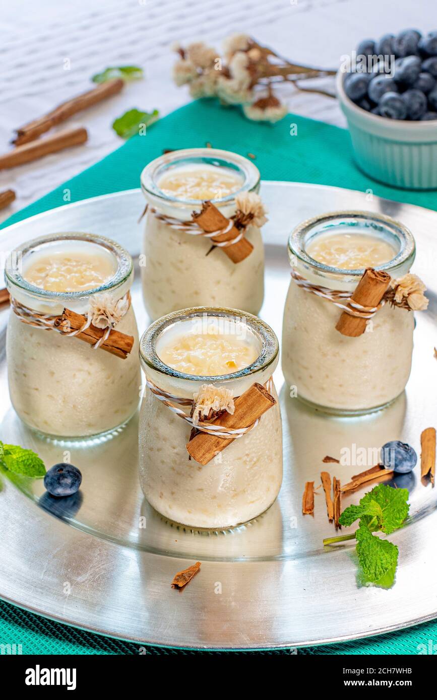 Milk rice pudding in pot with cinnamon Stock Photo - Alamy