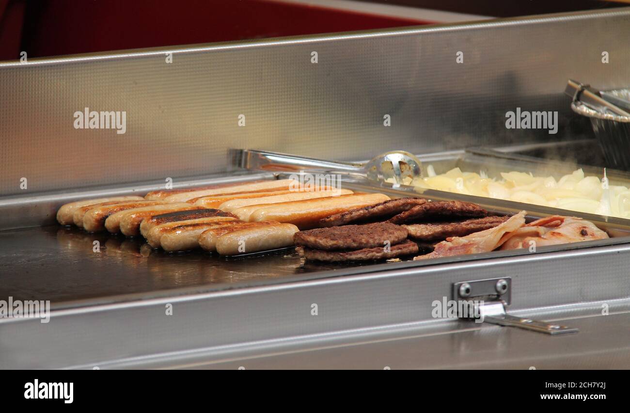 Fast Food Cooking on a Hot Grill Stock Photo - Alamy