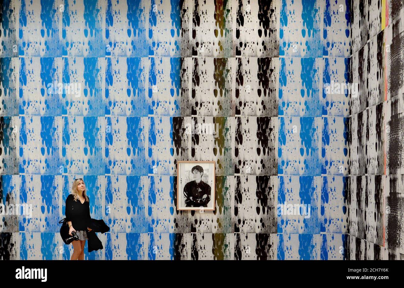 Visitor Lynsie Roberts views Ciara Phillips's 'Things Shared', 2014 ...