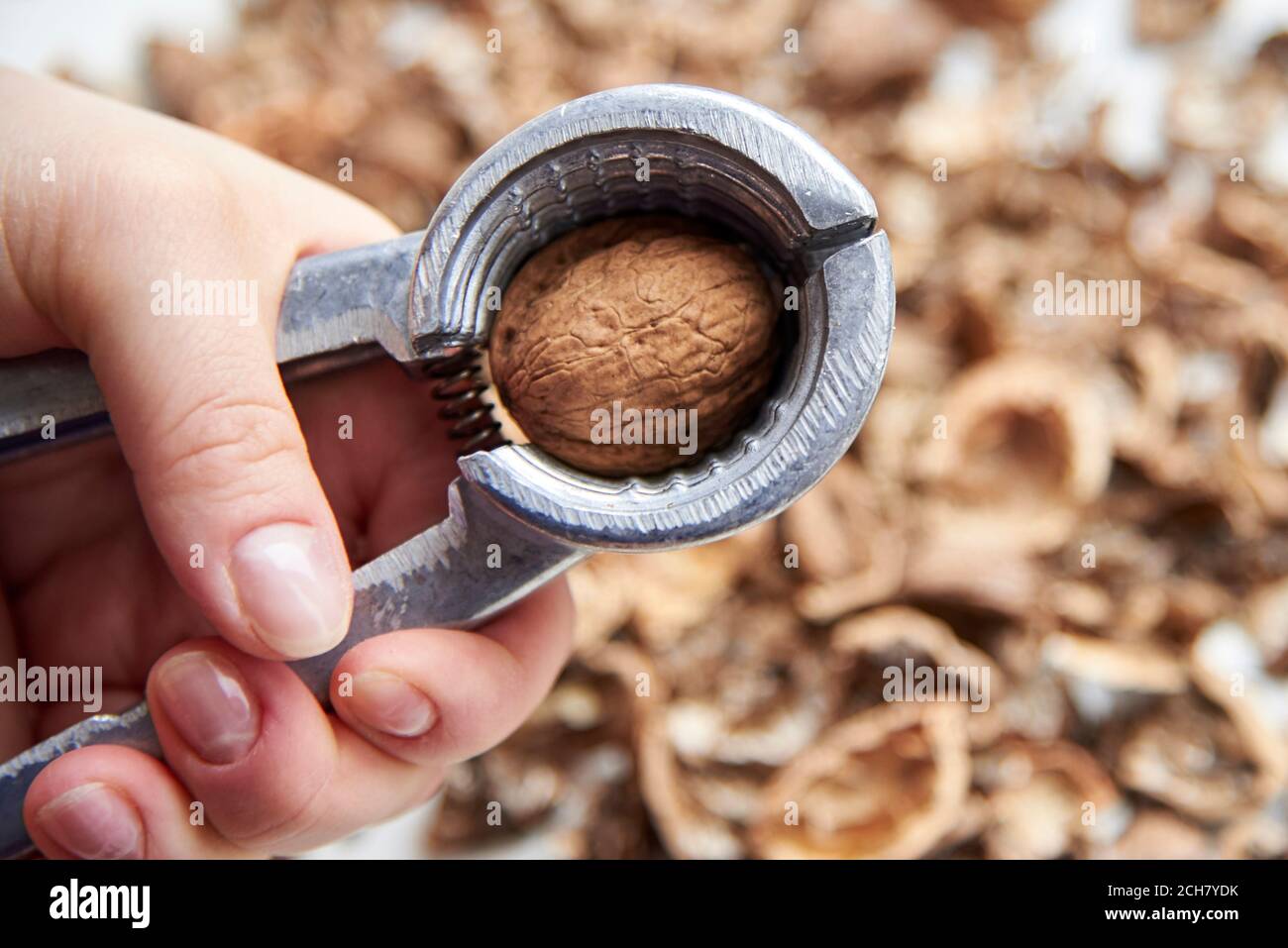 Woman break nut hi-res stock photography and images - Alamy